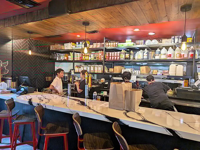 The counter offers front-row seats to the barbecue ballet &ndash; where smoke, meat, and skill perform their delicious dance.