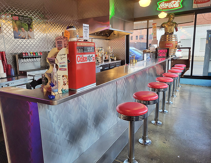Red vinyl stools and chrome details transport diners straight back to America's golden age of roadside dining.