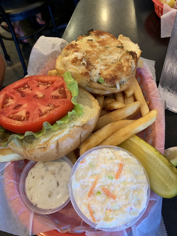 The ultimate handheld treasure: a crab cake sandwich that makes you wonder why you'd ever waste stomach space on ordinary burgers again.