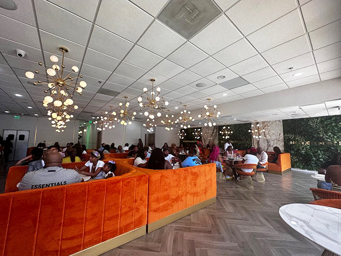 The buzz of happy diners fills this space, creating the perfect soundtrack for memorable meals and meaningful conversations.