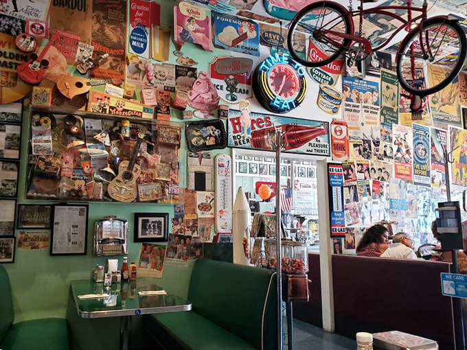 The mint-green booths aren't just seating&mdash;they're front-row tickets to the greatest show on earth: American diner culture in full swing.