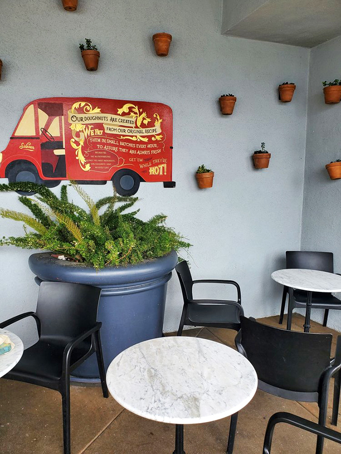 The outdoor seating area, complete with charming terracotta pots, offers a moment of California zen between sugar-fueled adventures.