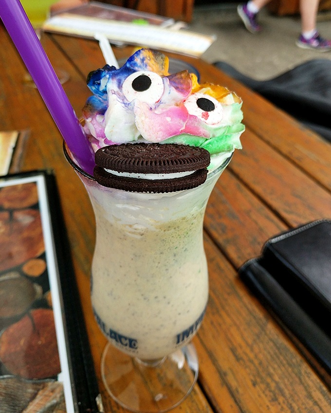 Dessert in a glass! This whimsical milkshake topped with cotton candy and an Oreo would make your inner child high-five your adult self.