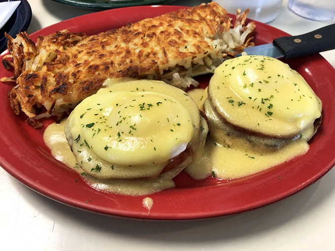 Eggs Benedict that's dressed for success with hollandaise so velvety it could moonlight as a sauce for royalty.