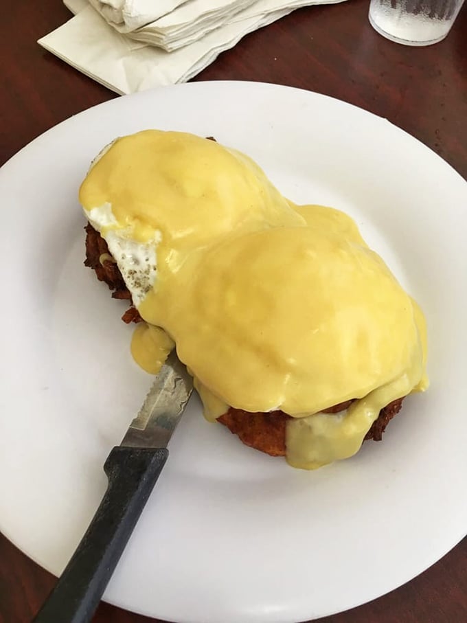 Eggs Benedict that would make a brunch snob weep with joy &ndash; perfectly poached eggs nestled under a hollandaise blanket of sunshine.