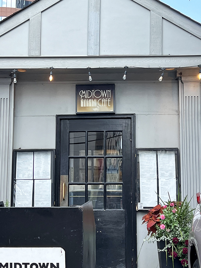 The entrance beckons like a portal to flavor country, with flowers standing guard to ensure only the food-obsessed may enter.