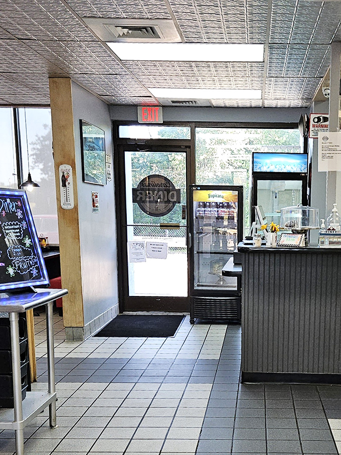 The exit sign&mdash;a portal you'll reluctantly approach only after your belt has been loosened and your soul thoroughly nourished.