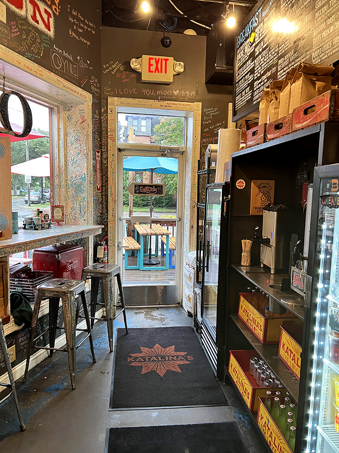 Even the exit is part of the experience&mdash;framed by years of happy scribbles from diners who couldn't leave without making their mark.