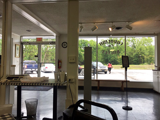 Sunlight streams through the entrance, illuminating the path to your next great meal. Some might call it just a doorway; regulars know it's a portal to satisfaction.