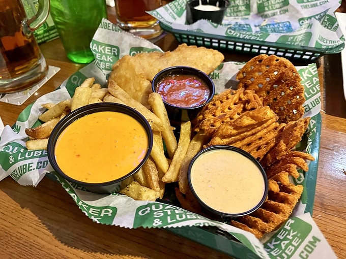 The appetizer sampler that solves all indecision problems. Three different fried delights with matching dips—democracy in action on a restaurant table.