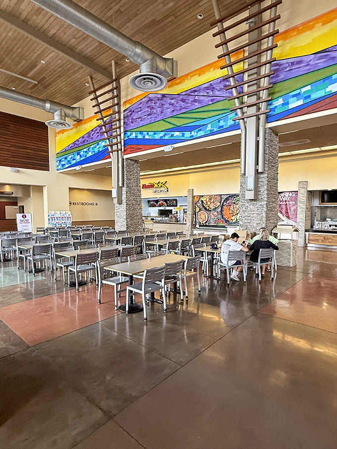 The food court&mdash;retail's version of a pit stop&mdash;where rainbow ceiling art distracts you from the fact that you're refueling to shop more.