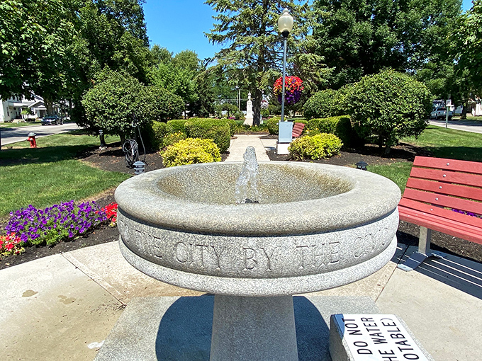Small-town charm distilled into a single fountain. This bubbling centerpiece has witnessed first kisses, marriage proposals, and countless coins tossed with whispered wishes.