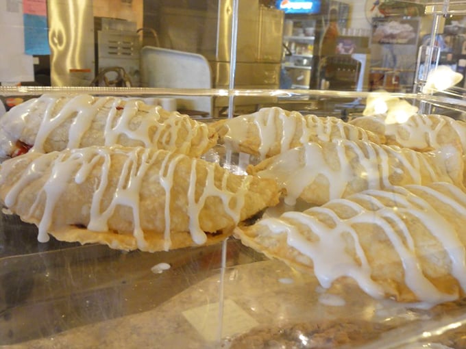 Hand pies drizzled with sweet glaze &ndash; portable perfection for those who understand that pie shouldn't be limited to sit-down occasions.