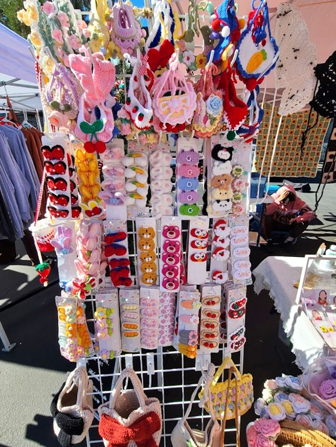 Handcrafted hair accessories and baby items create a kaleidoscope of color that would make even the most serious shopper crack a smile.