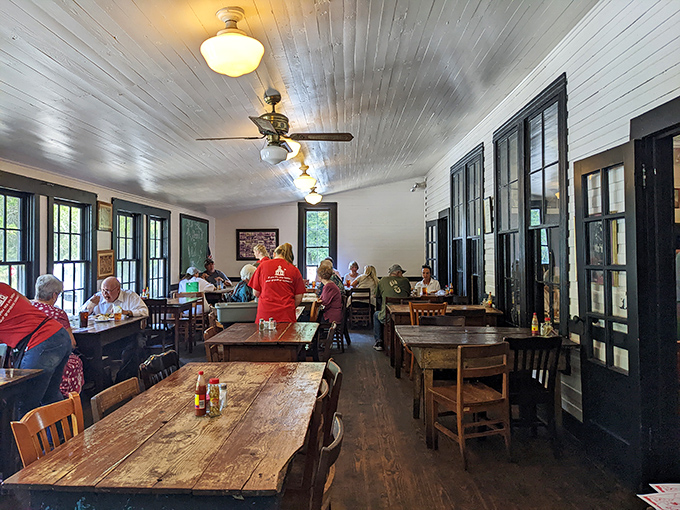 Ceiling fans spin lazily overhead as diners focus on the serious business of deciding between another piece of chicken or saving room for dessert.