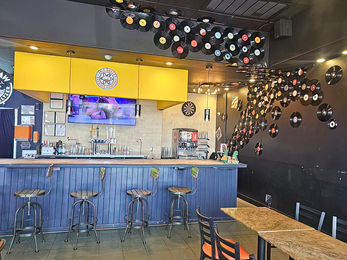 The thoughtful interior design balances modern elements with warmth&mdash;much like how a great burger balances savory, sweet, and tangy notes.