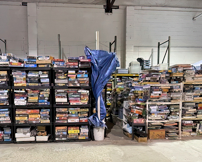 Board game Shangri-La where childhood memories are stacked floor to ceiling. Somewhere in here is the game that will have your family arguing happily for hours.