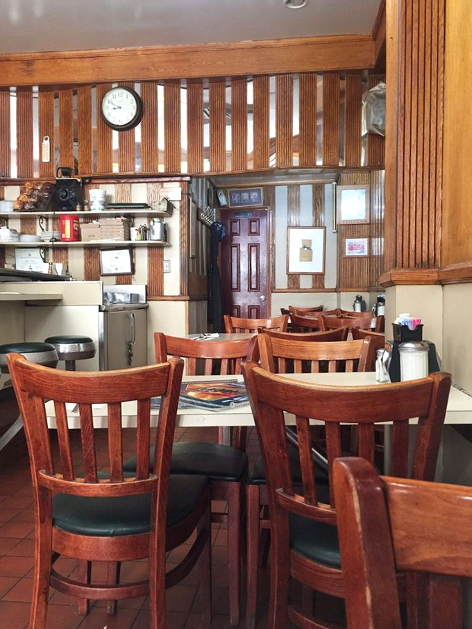 Empty chairs waiting for the next wave of hungry patrons. In a diner this beloved, they won't stay empty for long.