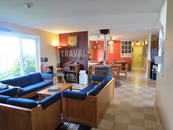 Inside reveals the hostel's cozy common area, where global travelers swap stories over coffee. Those blue couches have heard adventures from every continent.