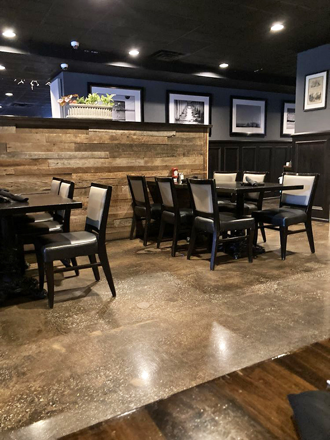 Rustic wood paneling meets contemporary comfort in a dining space that invites you to settle in and stay awhile.