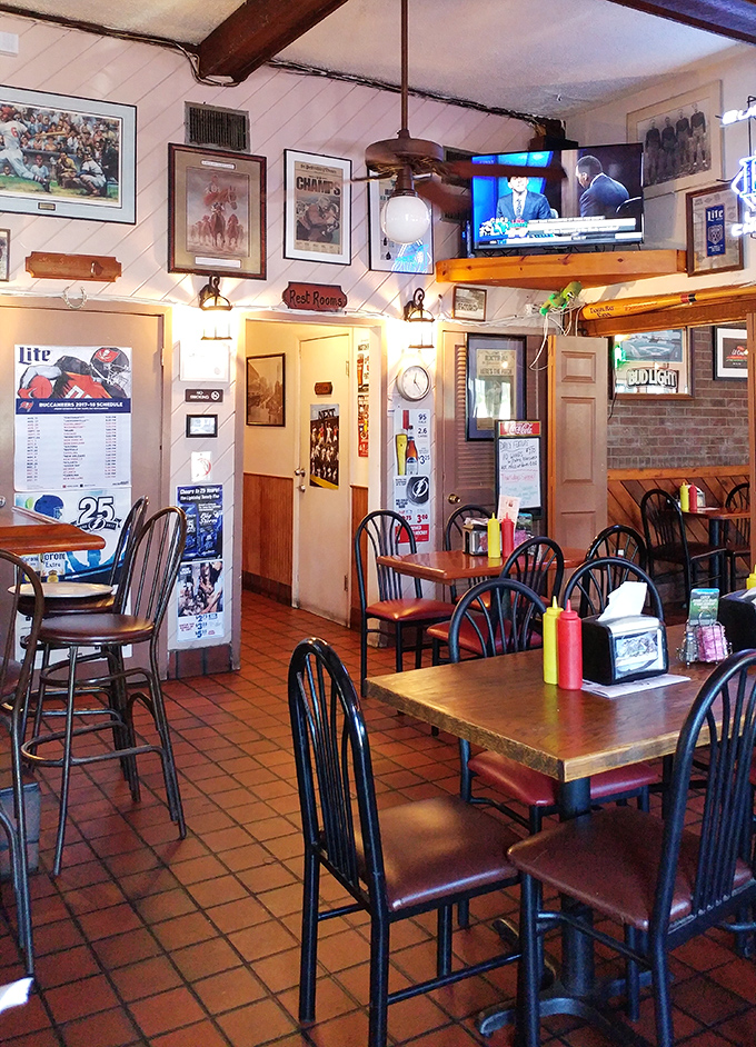 Every inch of wall space tells stories of local sports triumphs, creating the perfect backdrop for your own victory over hunger.