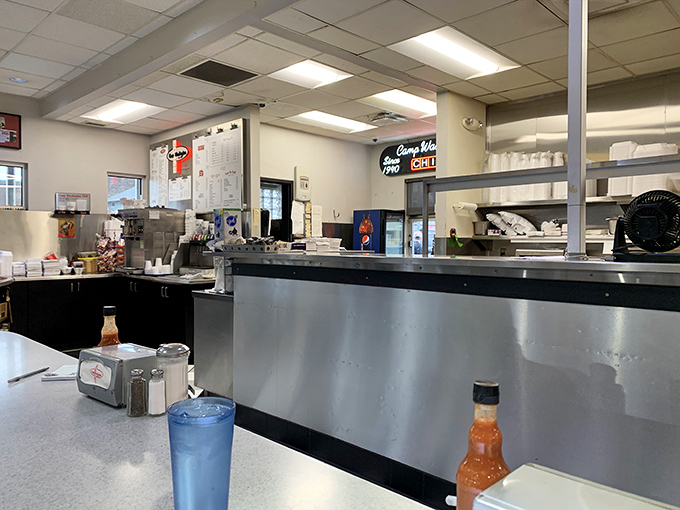 The kitchen view offers a glimpse into the organized chaos where Cincinnati's most famous culinary export comes to life, one order at a time.