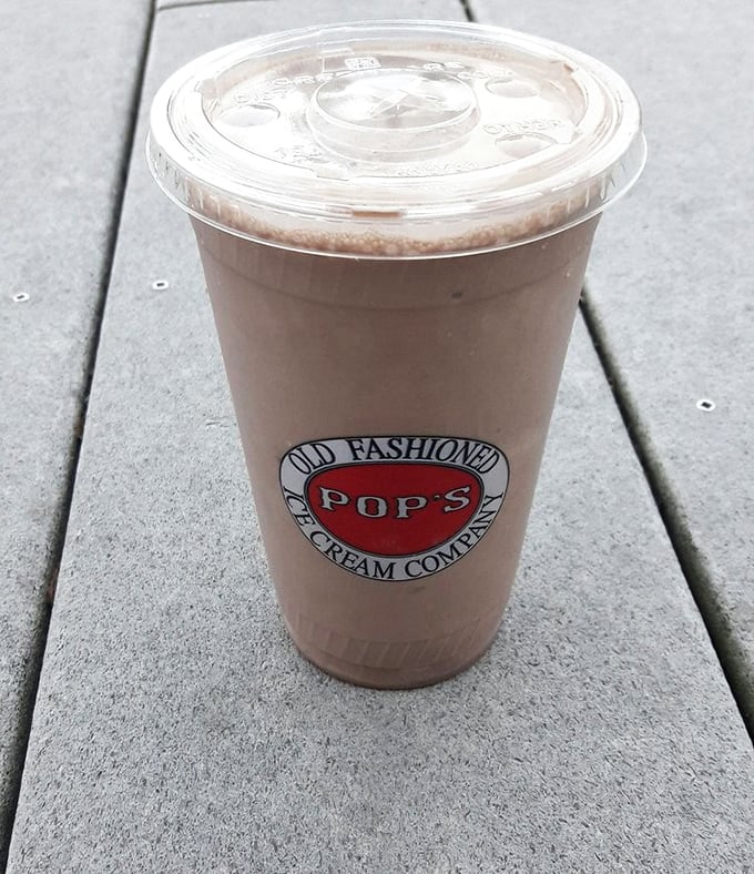 That milkshake isn't just a beverage; it's a frothy commitment to happiness packaged in a cup that tells stories of summers past.