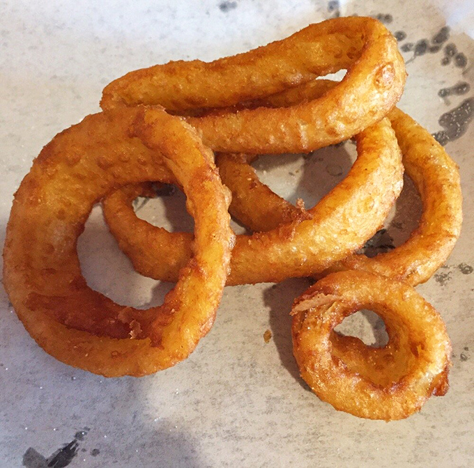 Onion rings with the perfect crunch-to-onion ratio. The side dish that frequently gets promoted to main event. 