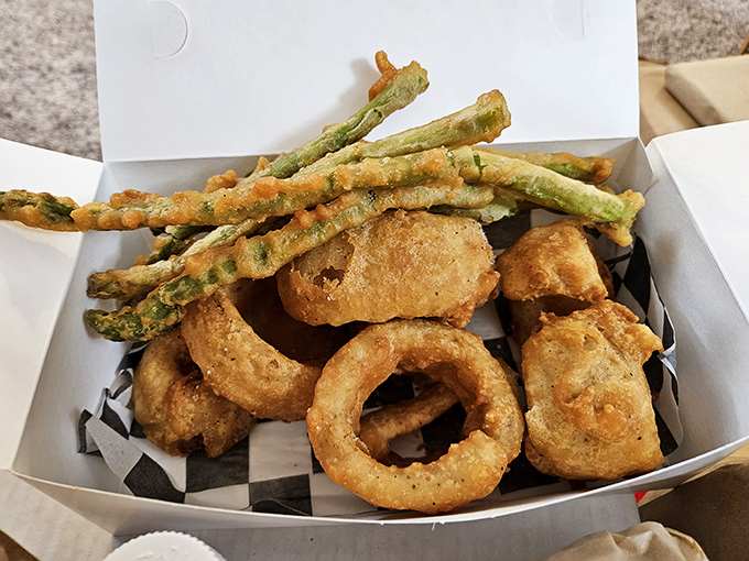 Vegetable tempura that makes eating greens feel rebellious. These crispy asparagus spears and onion rings redefine "getting your vegetables."