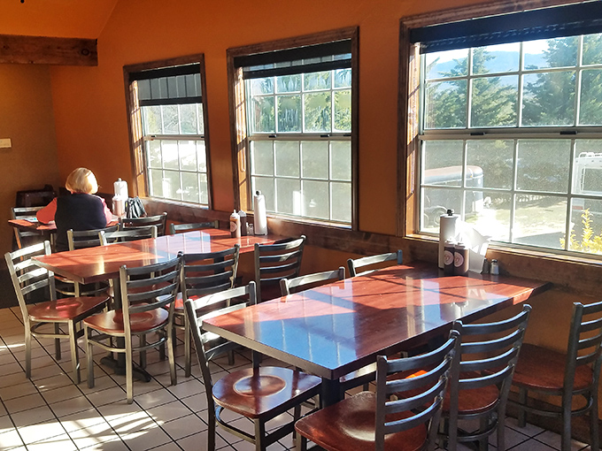 Sunlight streams through windows, illuminating tables awaiting the next round of BBQ enthusiasts. A moment of calm before the delicious storm.