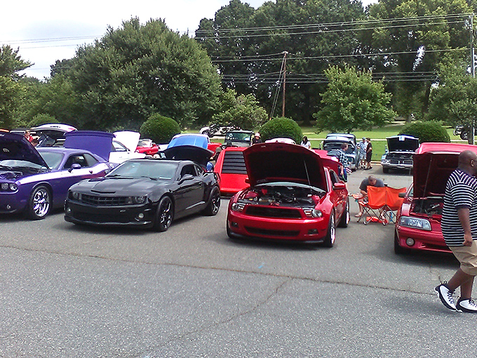 Even the parking lot becomes an impromptu car show, where modern muscle meets to pay homage to their ancestors inside.