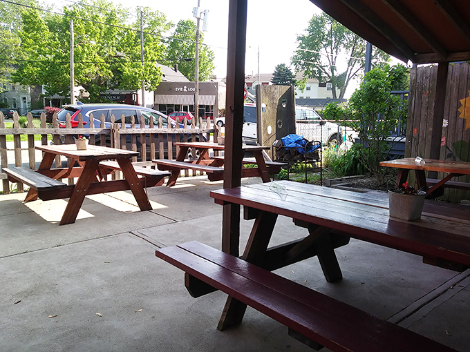Outdoor picnic tables where summer breezes enhance the flavor of everything from coffee to the last bite of your Reuben.