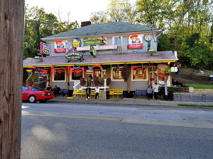 The exterior view shows a building that's not trying to be trendy—it's too busy being legendary. Those vintage signs have seen Cincinnati change around them.