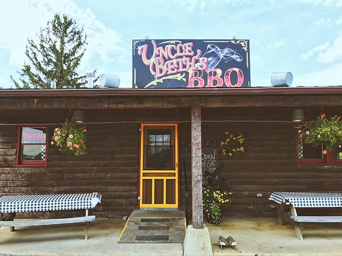 The exterior's cheerful yellow door and checkered benches invite you to sit a spell, as Midwesterners say, before the meat sweats kick in.