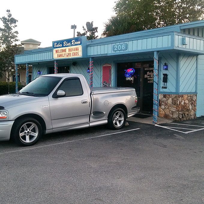 Parking spot perfection&mdash;close enough to smell what's cooking. The neon "Open" sign serves as a beacon for hungry souls.