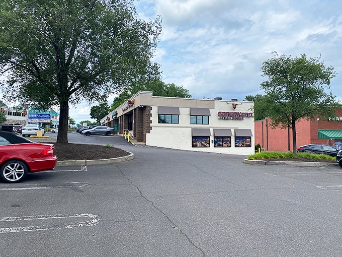 Even the parking lot seems to say, "Hurry inside, good things await." The building stands ready to welcome hungry travelers.
