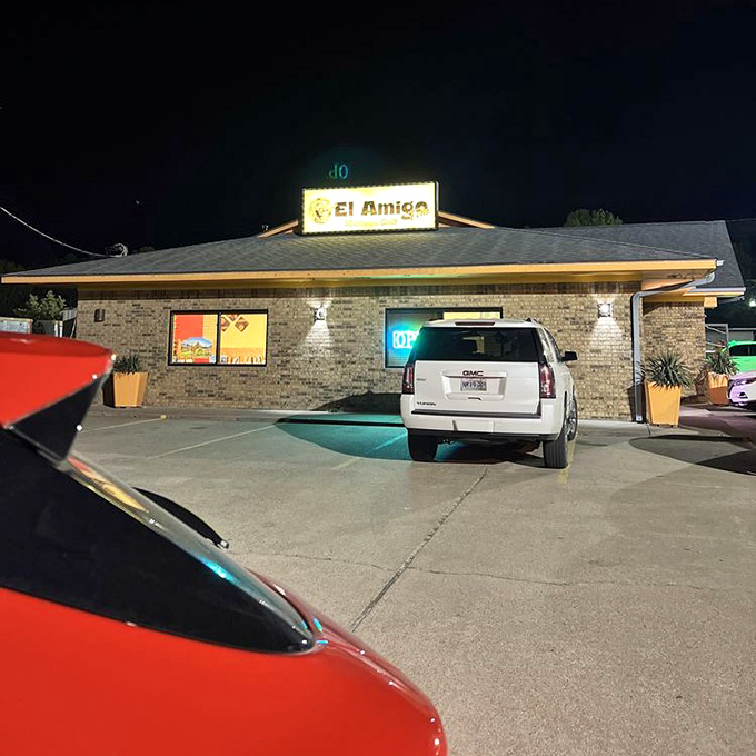 Even at night, El Amigo Feliz's welcoming glow beckons road-weary travelers. That illuminated sign is basically a lighthouse for the hungry.