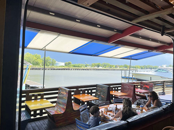 Waterfront dining where every table comes with a view and every breeze carries the promise of relaxation.
