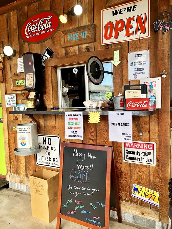 The pickup window&mdash;where dreams come true. Those handwritten specials tell you this place isn't working from some corporate recipe book.