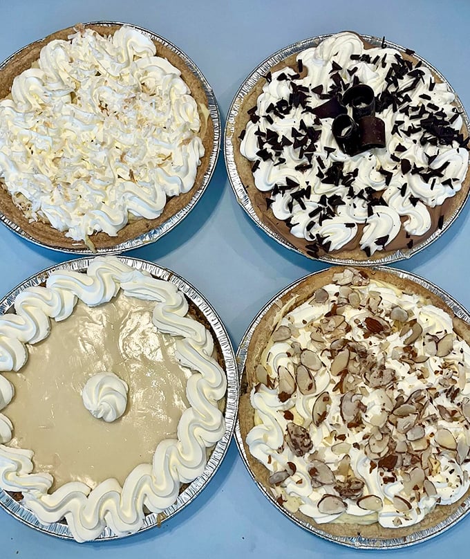 Four pies that represent the major food groups: cream, chocolate, fruit, and "I'll have them all, please."