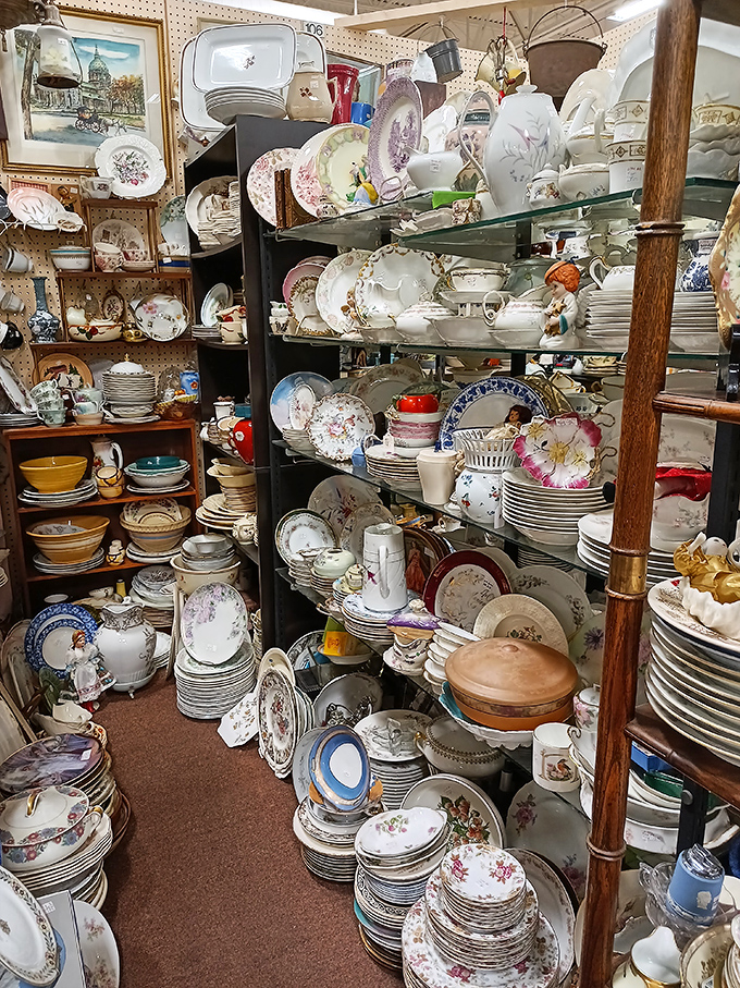 China patterns that outlasted marriages, stacked with the precision of a ceramic Jenga tower waiting to grace new tables.