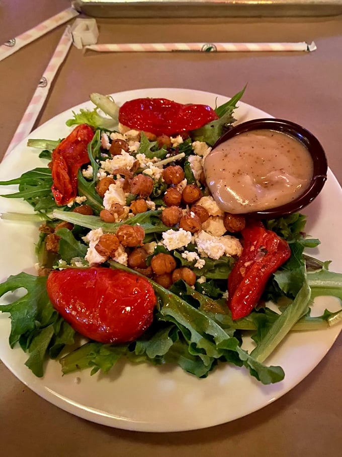 A salad that doesn't apologize for being at a barbecue joint. Those roasted tomatoes and crispy chickpeas are playing in the big leagues now.