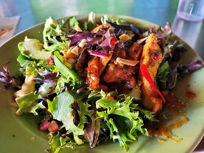 A salad that doesn't apologize for being healthy&mdash;grilled chicken and mixed greens playing so well together you'll forget you ordered the "light option."