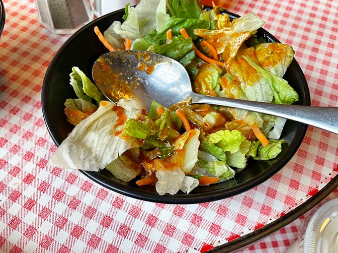A simple garden salad that somehow manages to make vegetables interesting enough to eat before the main course arrives.