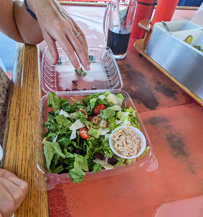 A fresh tossed salad that doesn't feel like punishment. Crisp greens, colorful veggies, and a portion of their famous turkey make healthy actually satisfying.