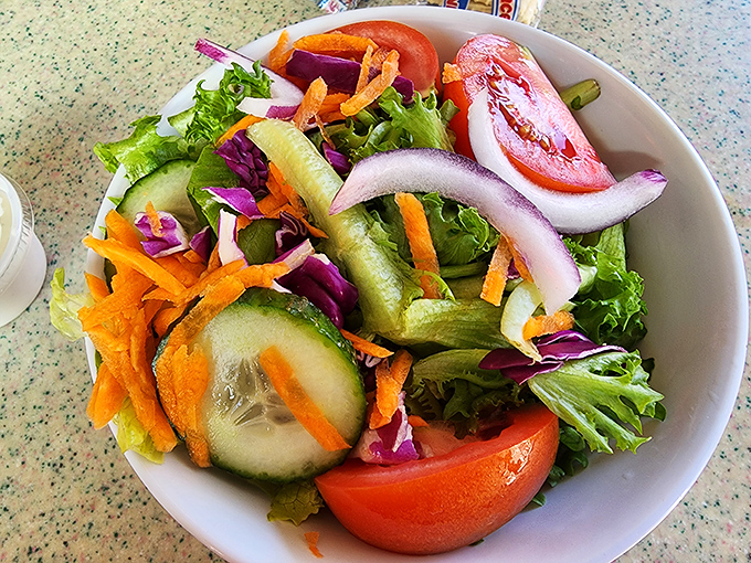 Fresh garden salad provides the perfect crisp counterpoint to all that rich, satisfying seafood you're about to devour.