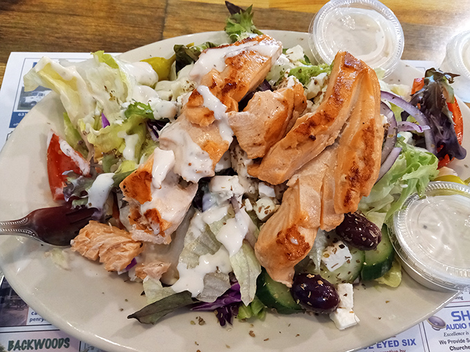 A grilled chicken salad that defies the sad desk lunch stereotype&mdash;generous, colorful, and proof that "eating light" doesn't mean leaving hungry.