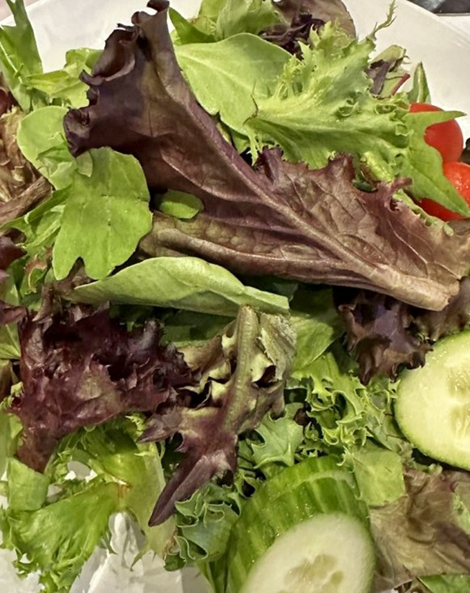 Even the salad gets special treatment here, offering a crisp, refreshing interlude between bites of rich seafood.