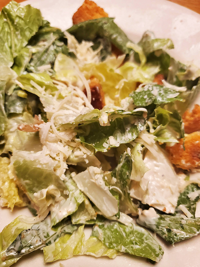 A Caesar salad that actually tries. Those homemade croutons didn't come from a bag, and that dressing wasn't born in a bottle—little victories for your lunch hour.