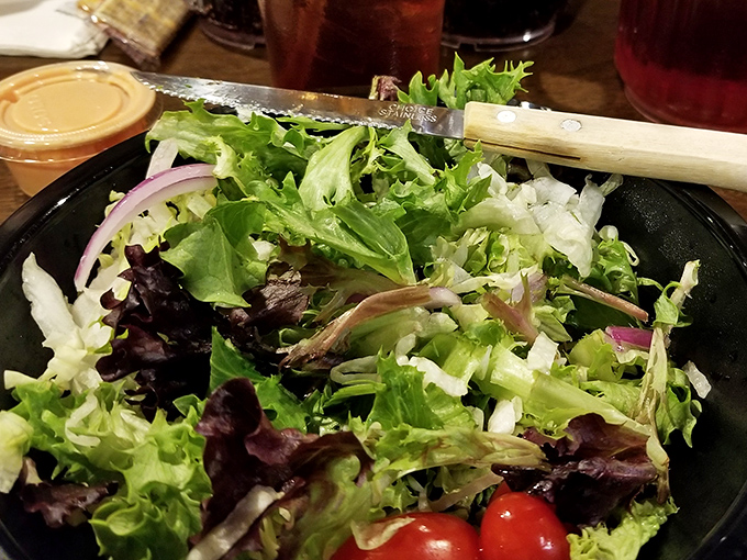 Even the salad looks like it's having more fun here&mdash;fresh, colorful, and completely judgment-free about what you ordered for your main course.